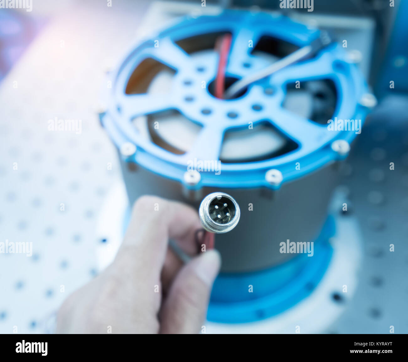 Hand with robotic plug cables Stock Photo - Alamy