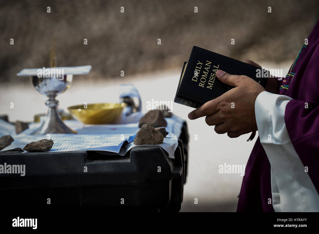 A French Naval Catholic Priest conducts a church service in the field ...