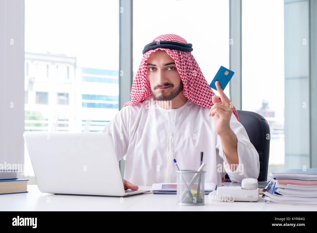 Arab businessman working in the office Stock Photo - Alamy