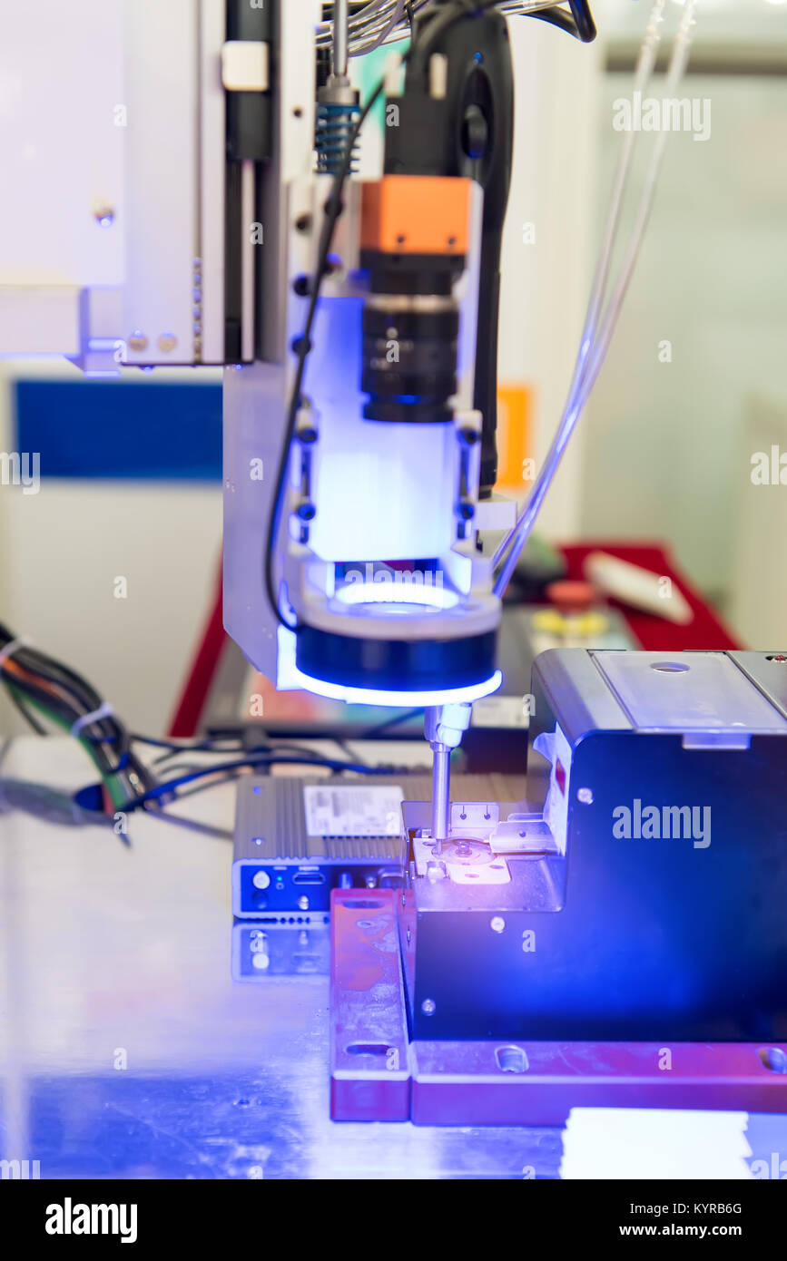 Robotic machine vision system in phone factory Stock Photo - Alamy