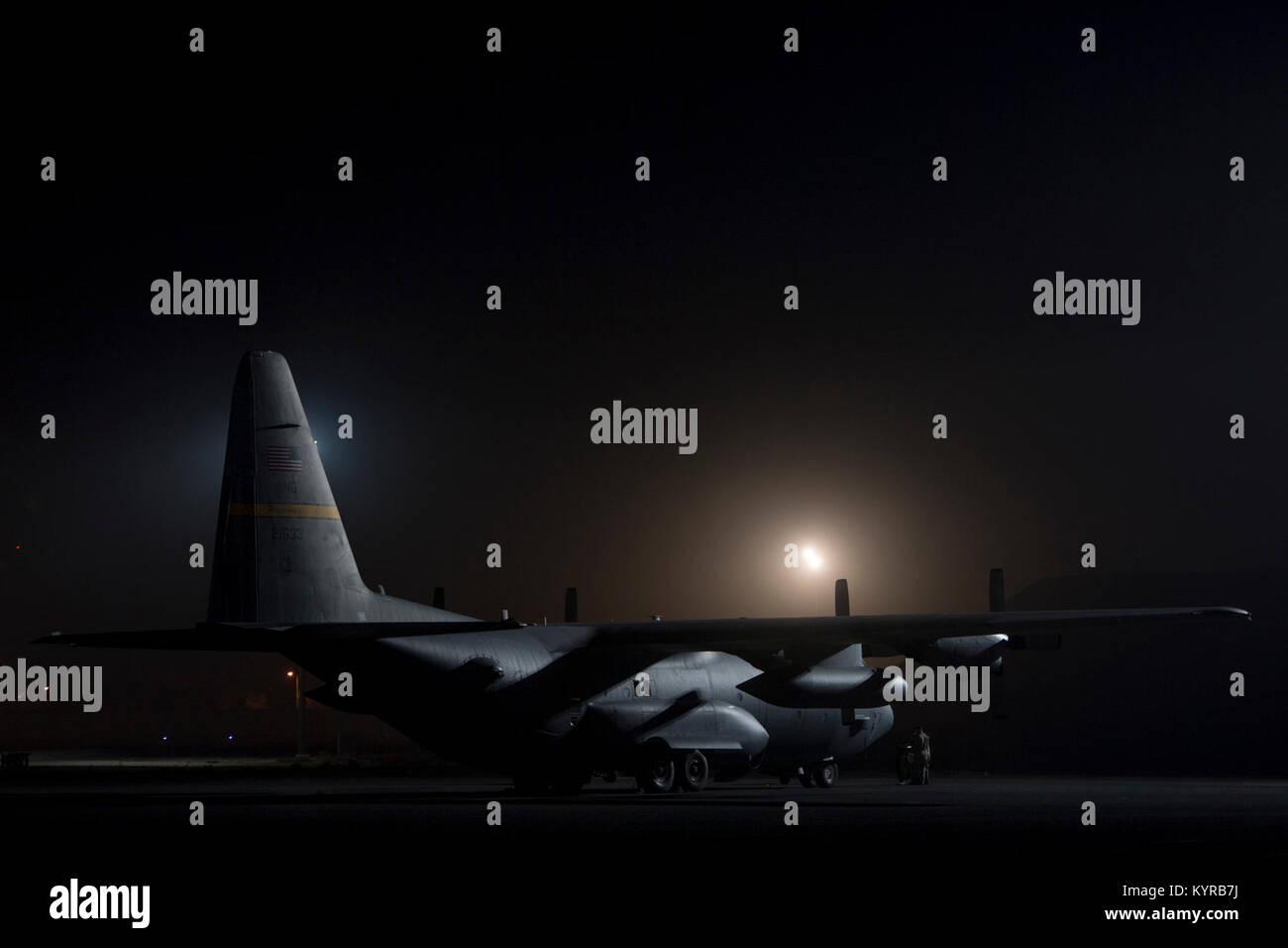A U.S. Air Force C-130 Hercules is parked on the flight line at ...