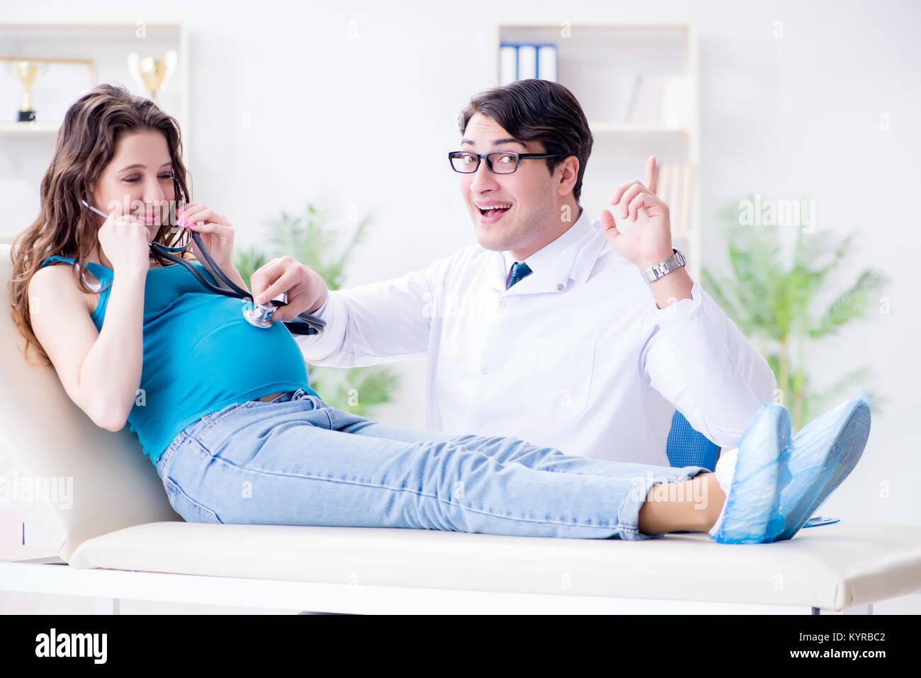 Doctor examining pregnant female patient in hospital Stock Photo - Alamy