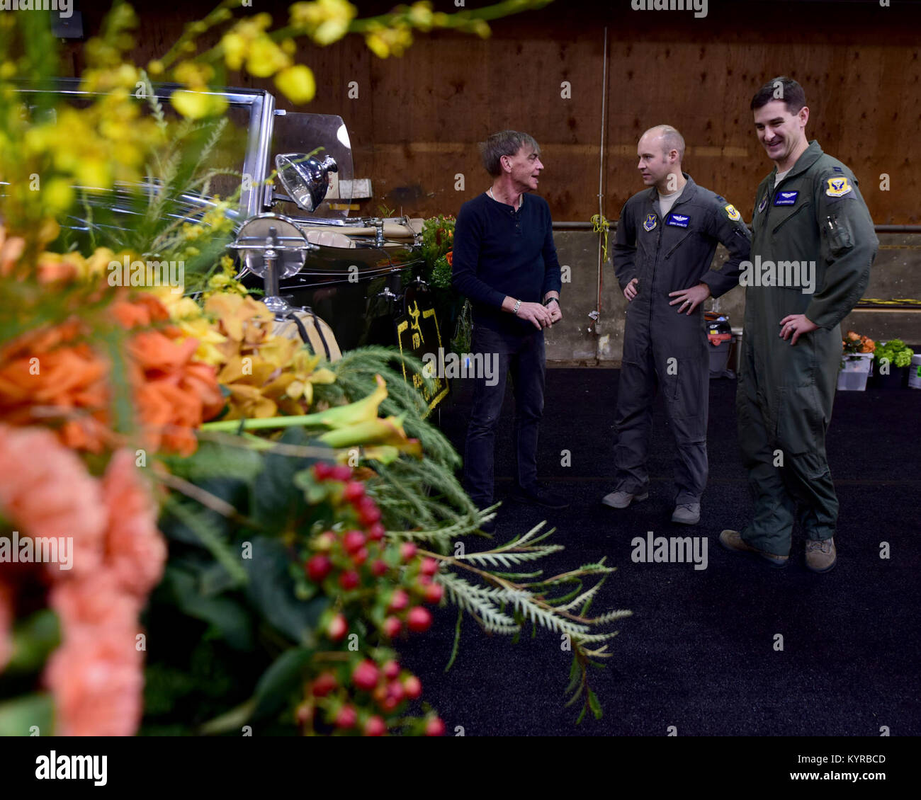 U.S. Air Force Capt. Joseph Manglitz, center, and Capt. Kyle Harrington ...