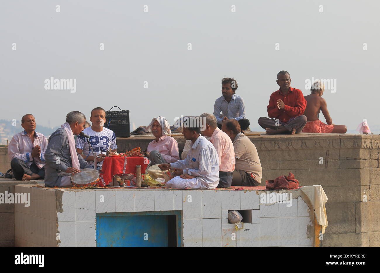 People gather for religious chant on Ganges river Varanasi India Stock ...