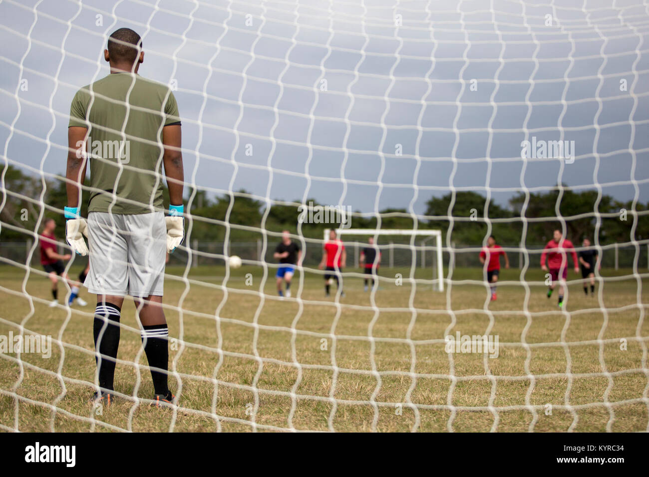 CAMP HANSEN, OKINAWA, Japan- Sgt. Abraham Hunt guards his team’s goal ...