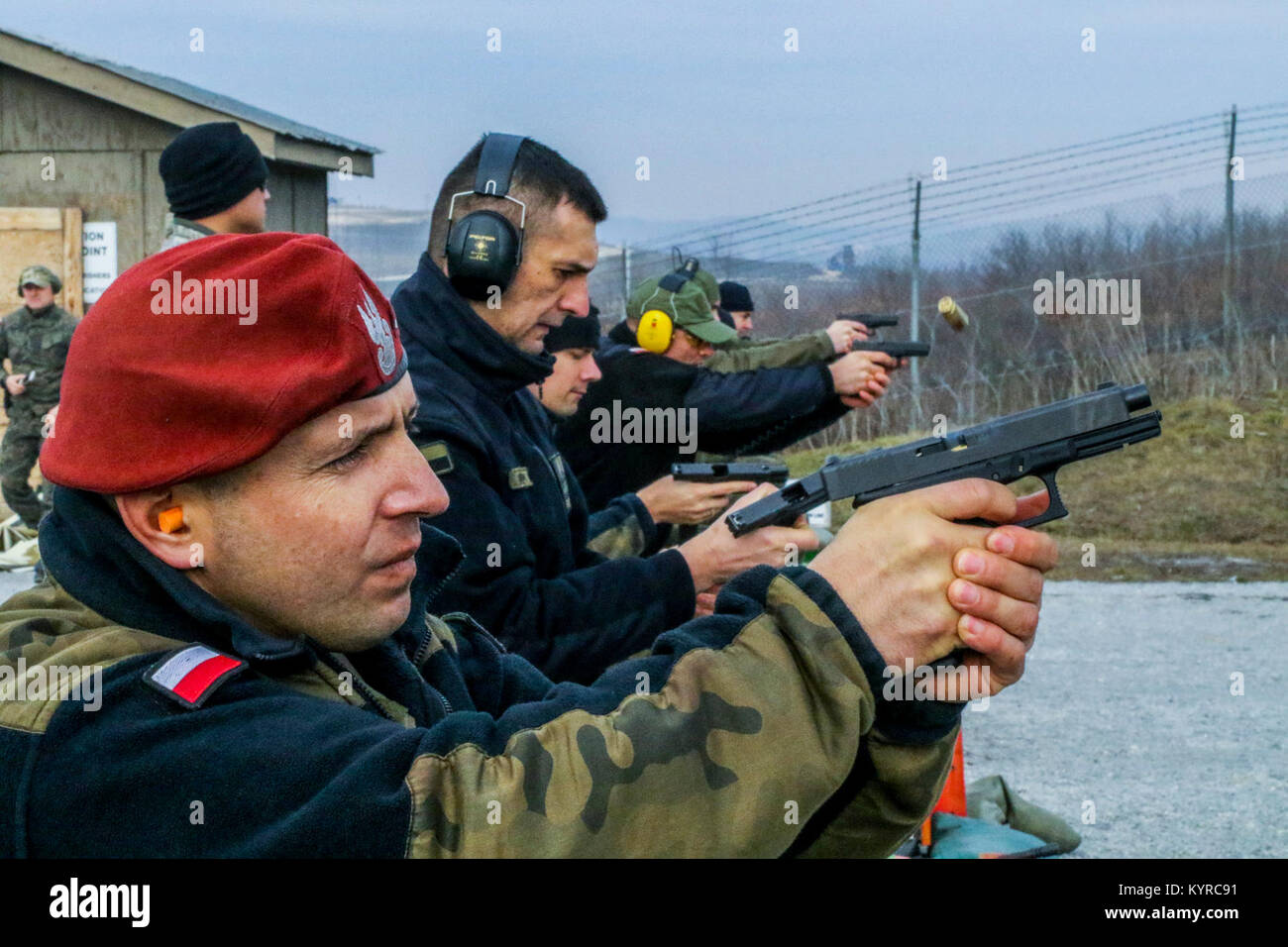 Polish Soldiers shoot their military service pistol during the U.S ...
