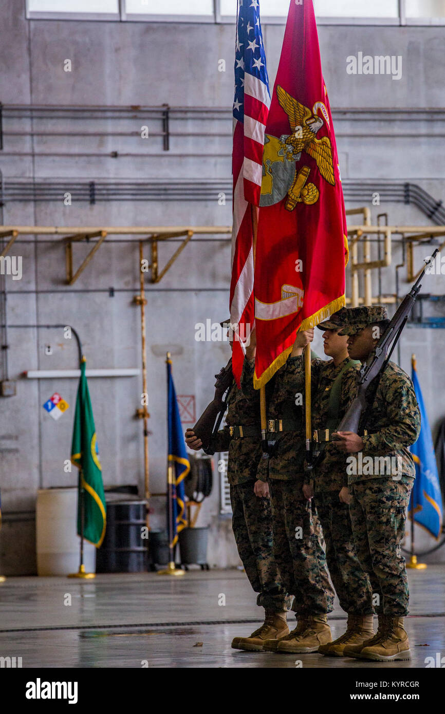 U.S. Marines with the color guard participate in a post and relief ...