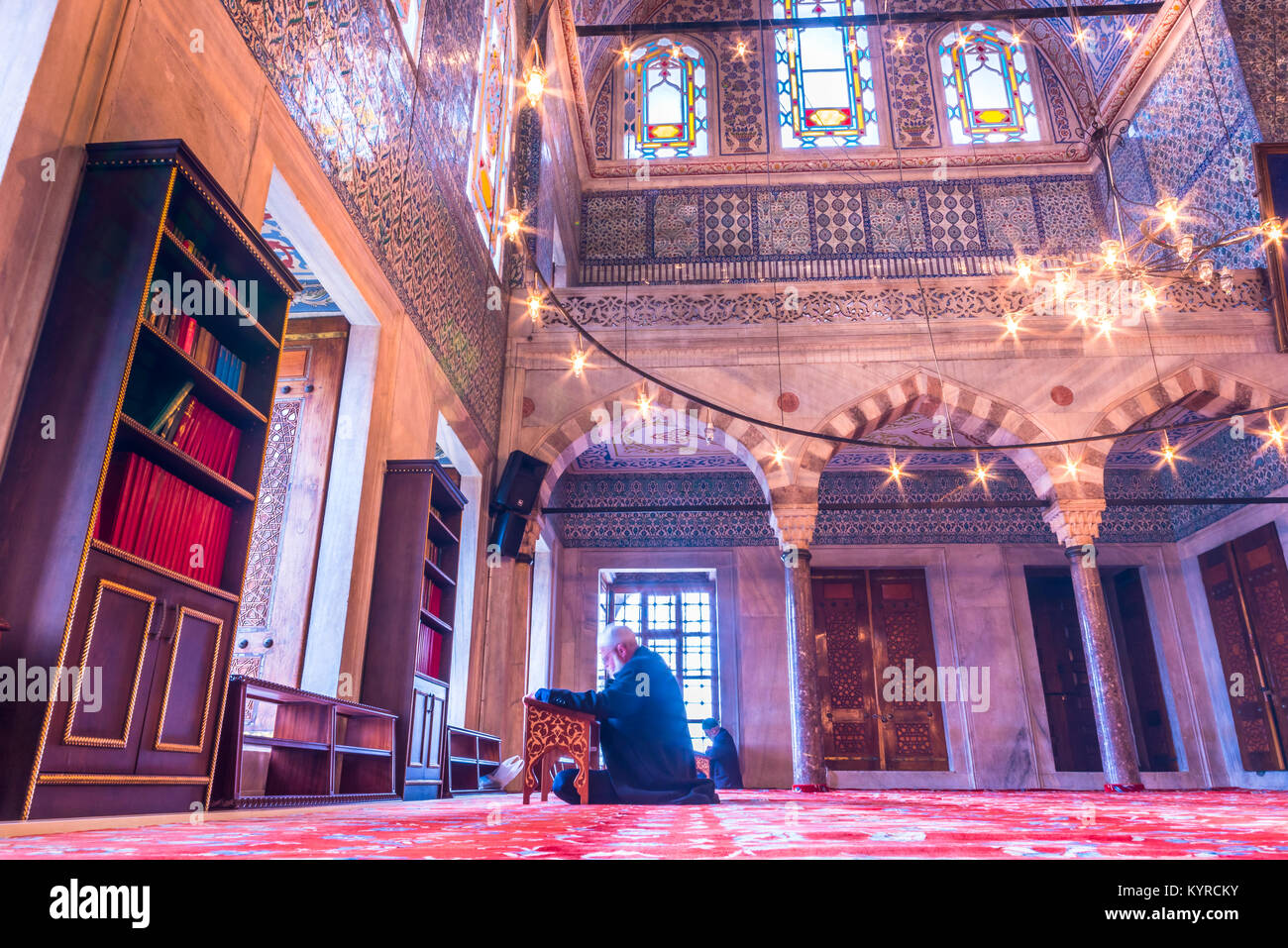 Muslim People praying in Blue Mosque also called Sultan Ahmed Mosque or ...