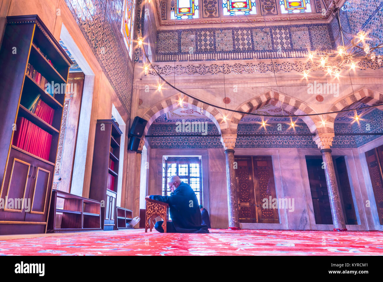 Muslim People praying in Blue Mosque also called Sultan Ahmed Mosque or ...