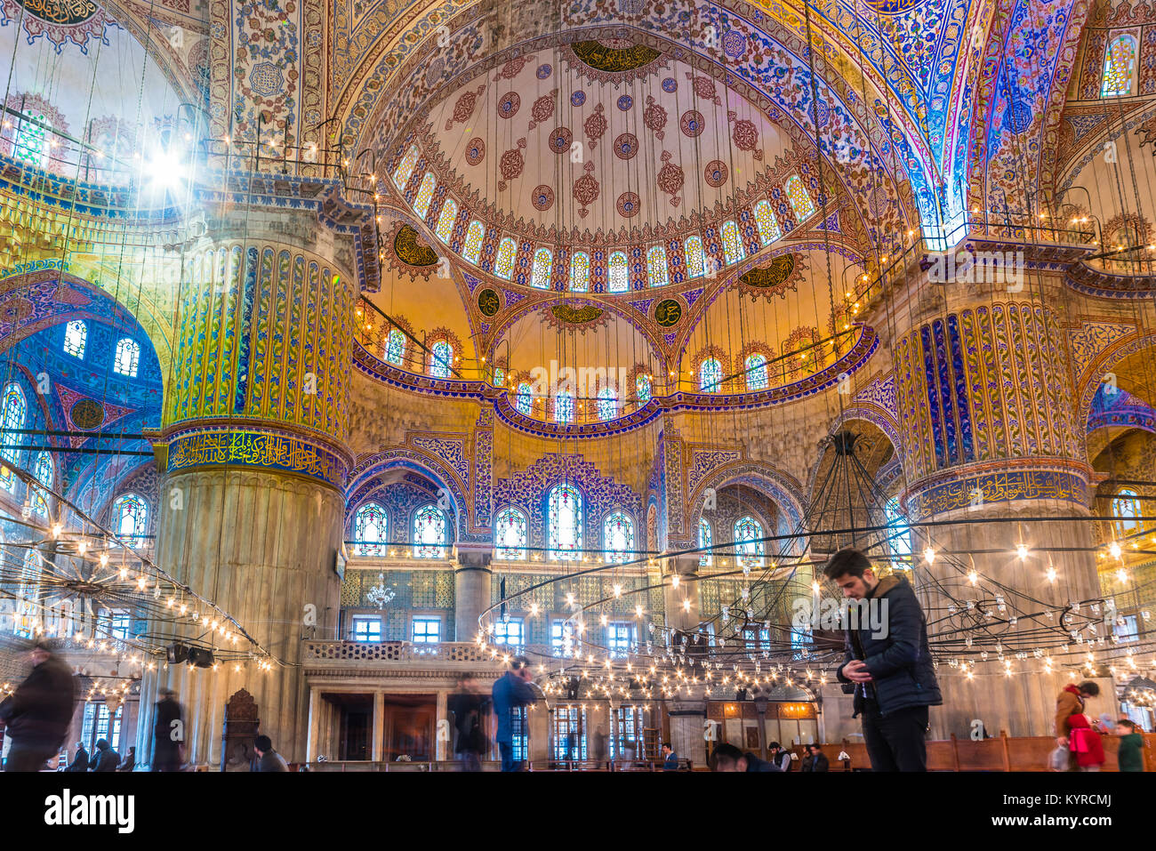 Muslim People praying in Blue Mosque also called Sultan Ahmed Mosque or ...