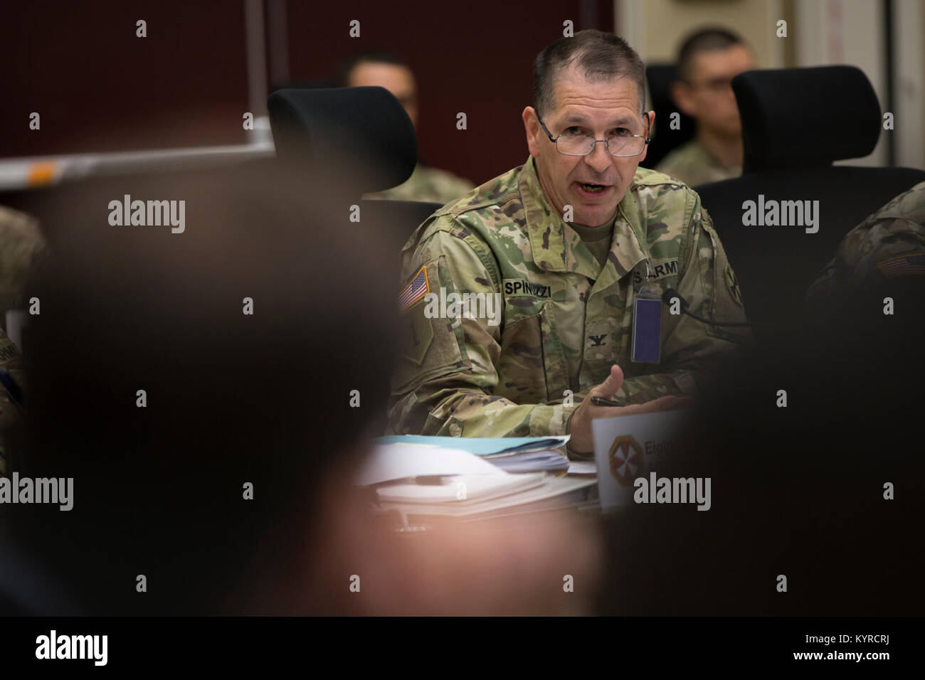 U.S. Army Col. Marc Spinuzzi briefs the Secretary of the Army Mark T ...