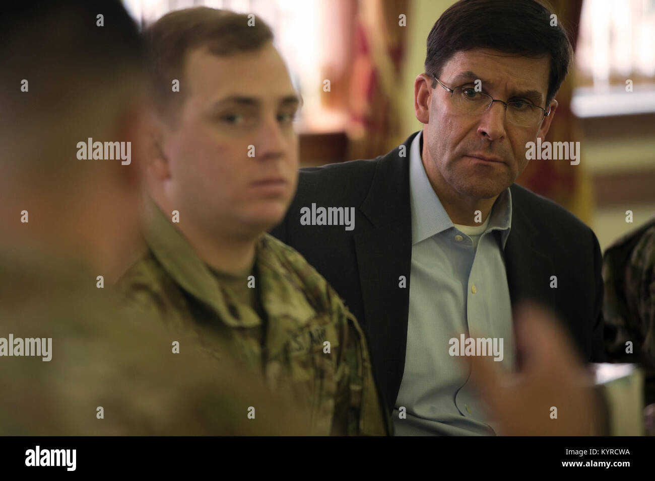 Secretary of the Army Mark T. Esper talks with Soldiers during lunch at ...