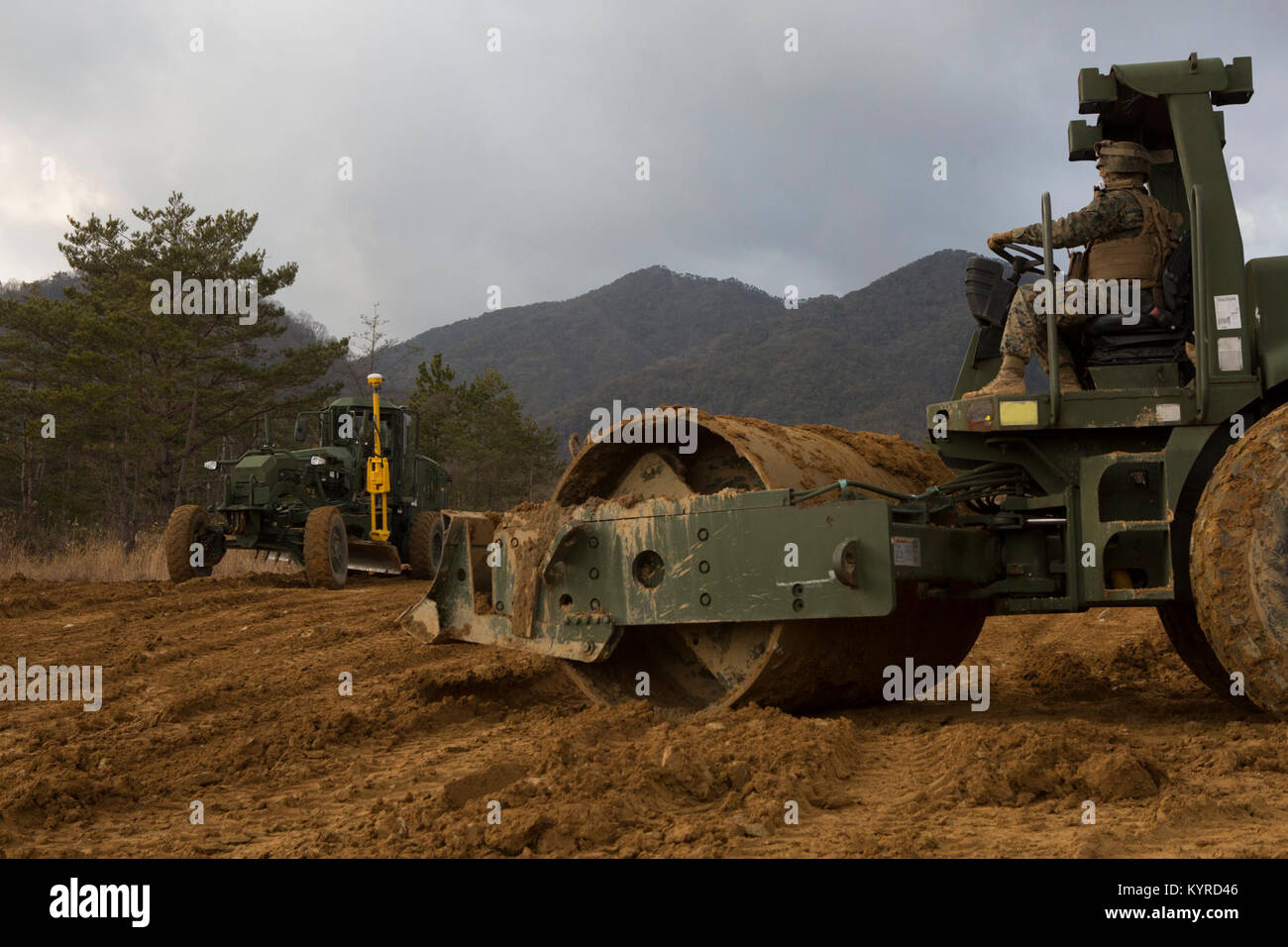 U.S. Marines with Marine Wing Support Squadron (MWSS) 171 flatten ...