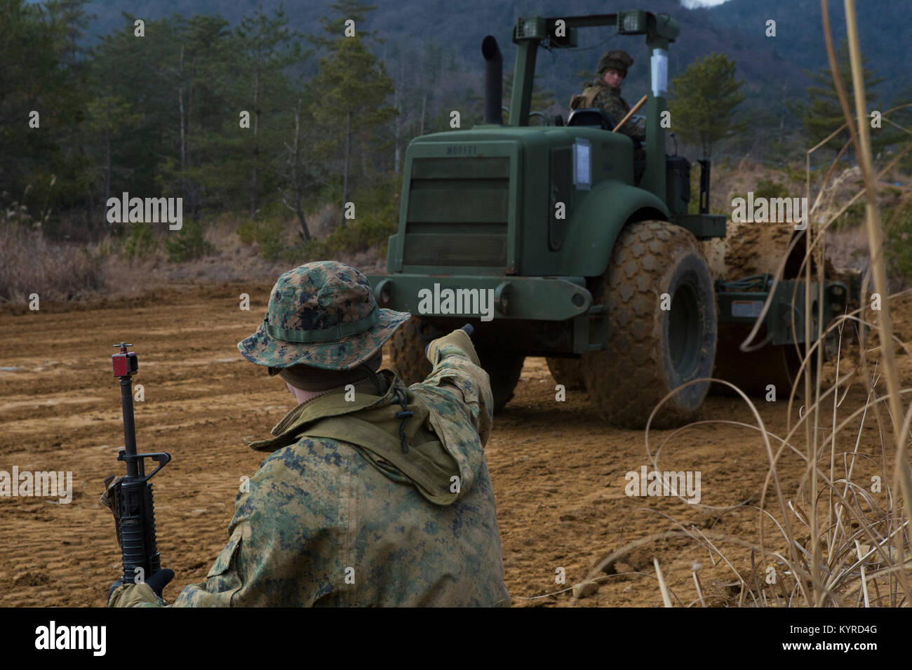 U.S. Marines with Marine Wing Support Squadron (MWSS) 171 flatten ...