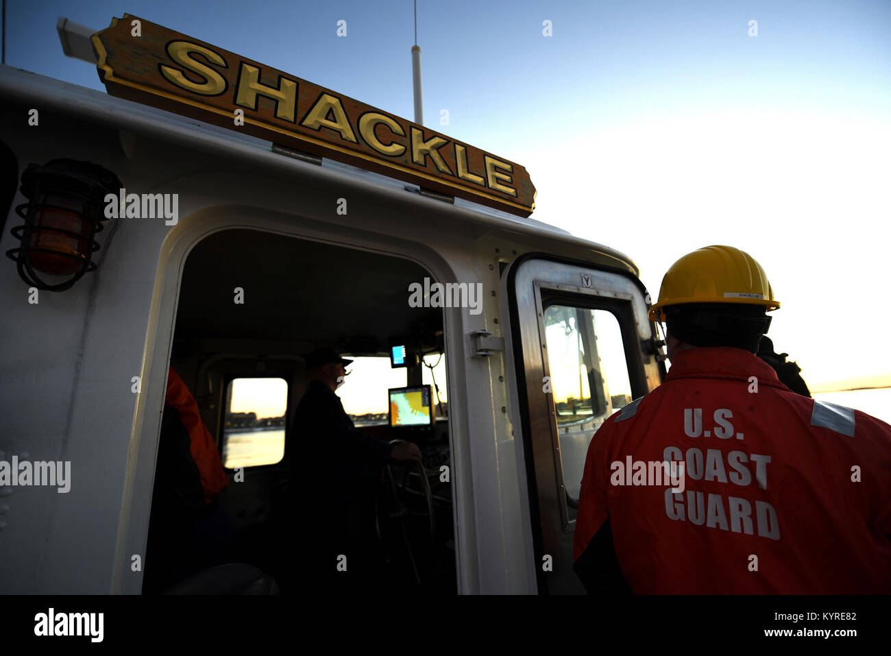 The crew of Coast Guard Cutter Shackle, a 65-foot Small Harbor Tug ...