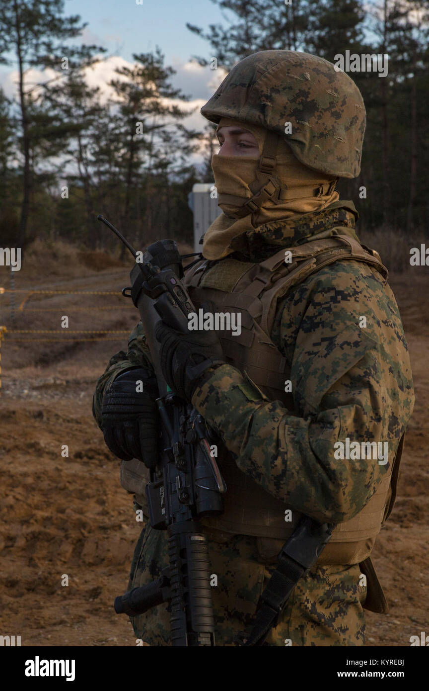 U.S. Marine Corps Lance Cpl. Samuel Tommy, an expeditionary airfield ...