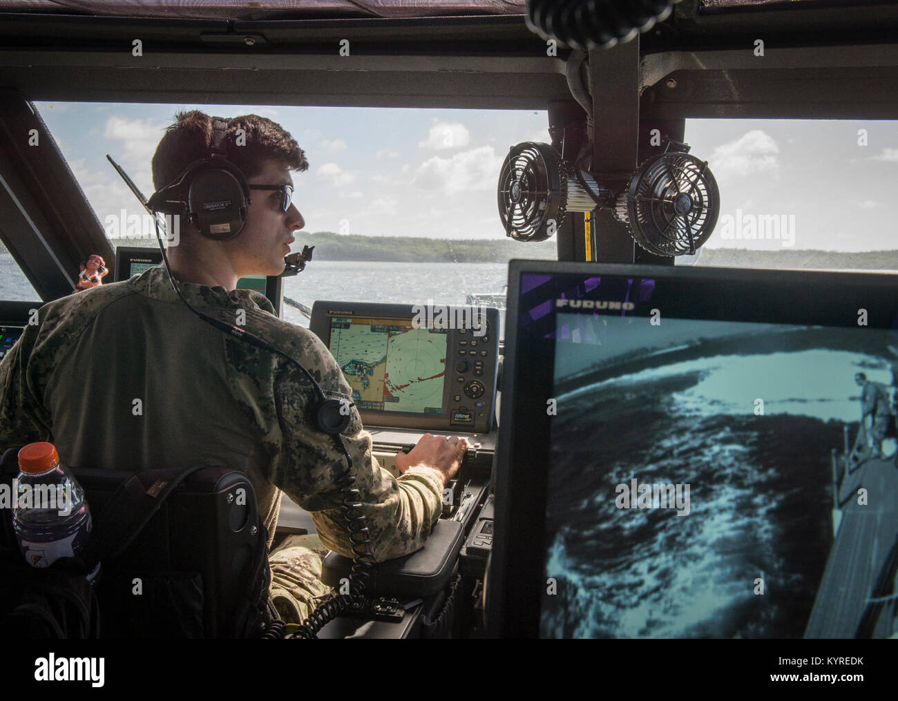 U.S. Navy Quartermaster 3rd Class Zachary Rice, assigned to Coastal ...
