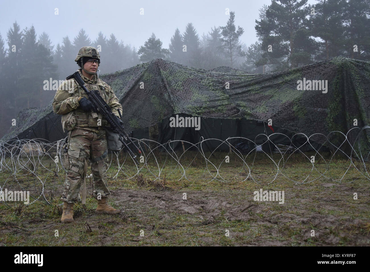 U.S. Army Pvt. Hector Cisneros with the 527th Military Police Company ...