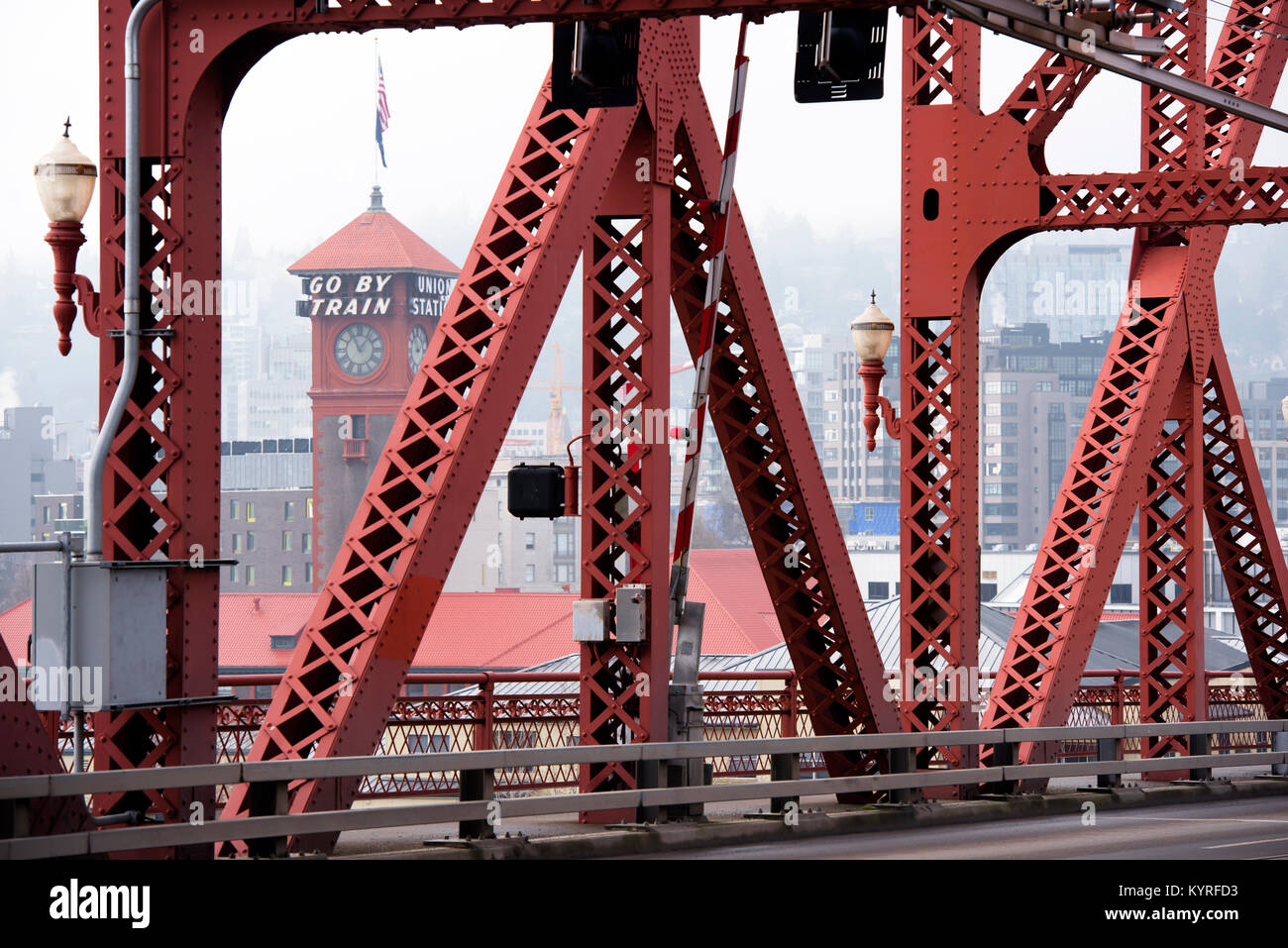 Red metal truss Broadway Bridge over Willamette River in the heart of ...