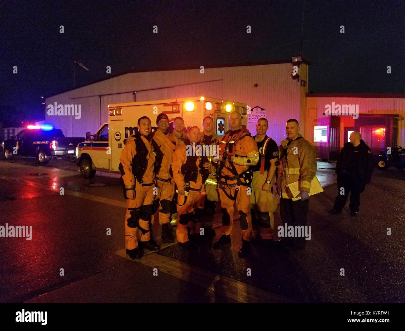 Rescue crews from Air Station Detroit and EMS pose for a Stock Photo ...