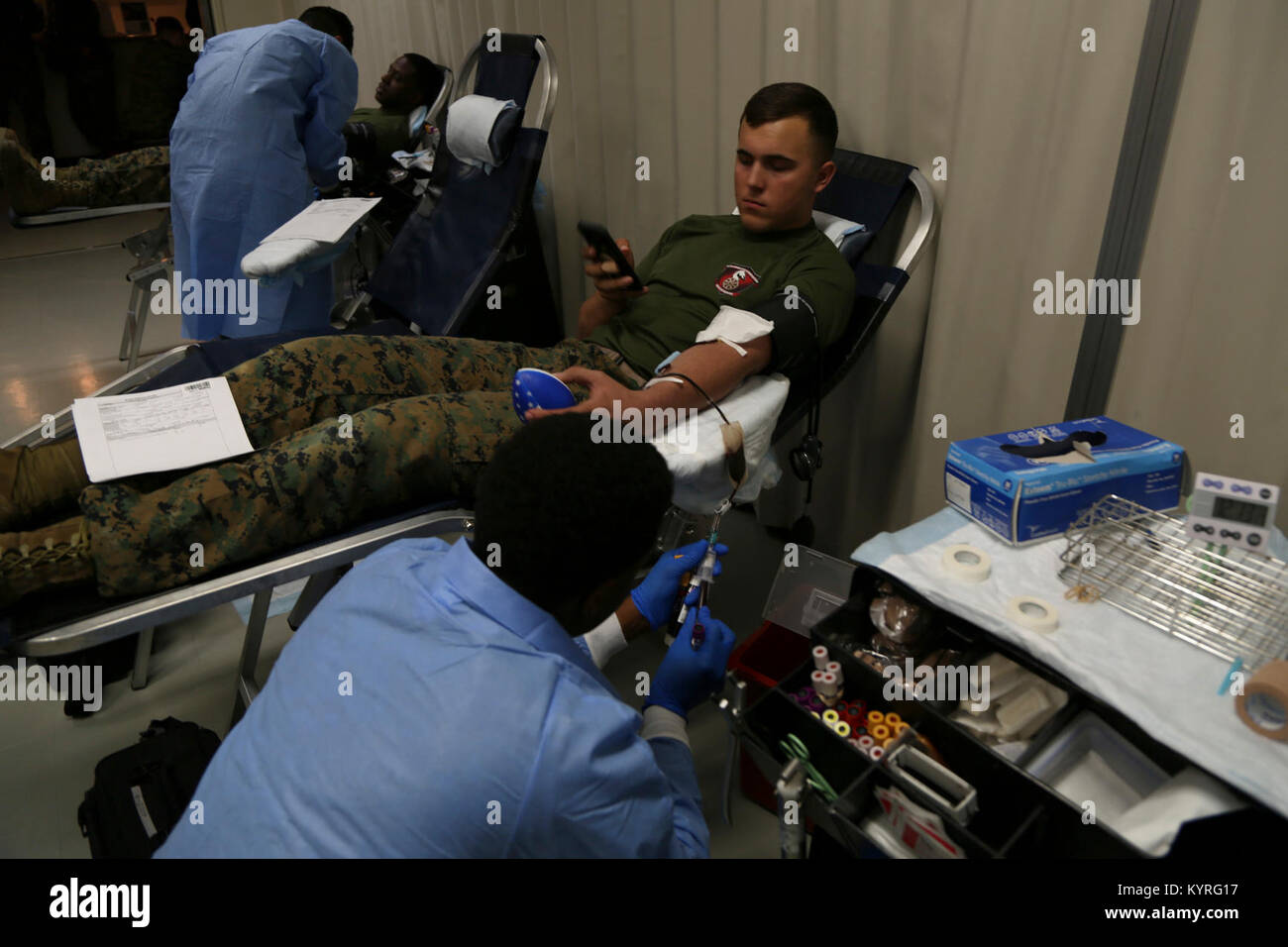 CAMP FOSTER, OKINAWA, Japan – Pfc. Isriah Senel watches the lab ...