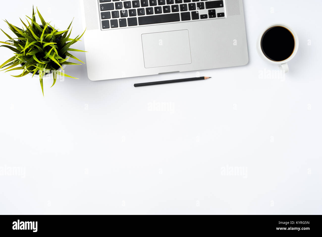 Office desktop with modern laptop and accessories. Top view Stock Photo ...