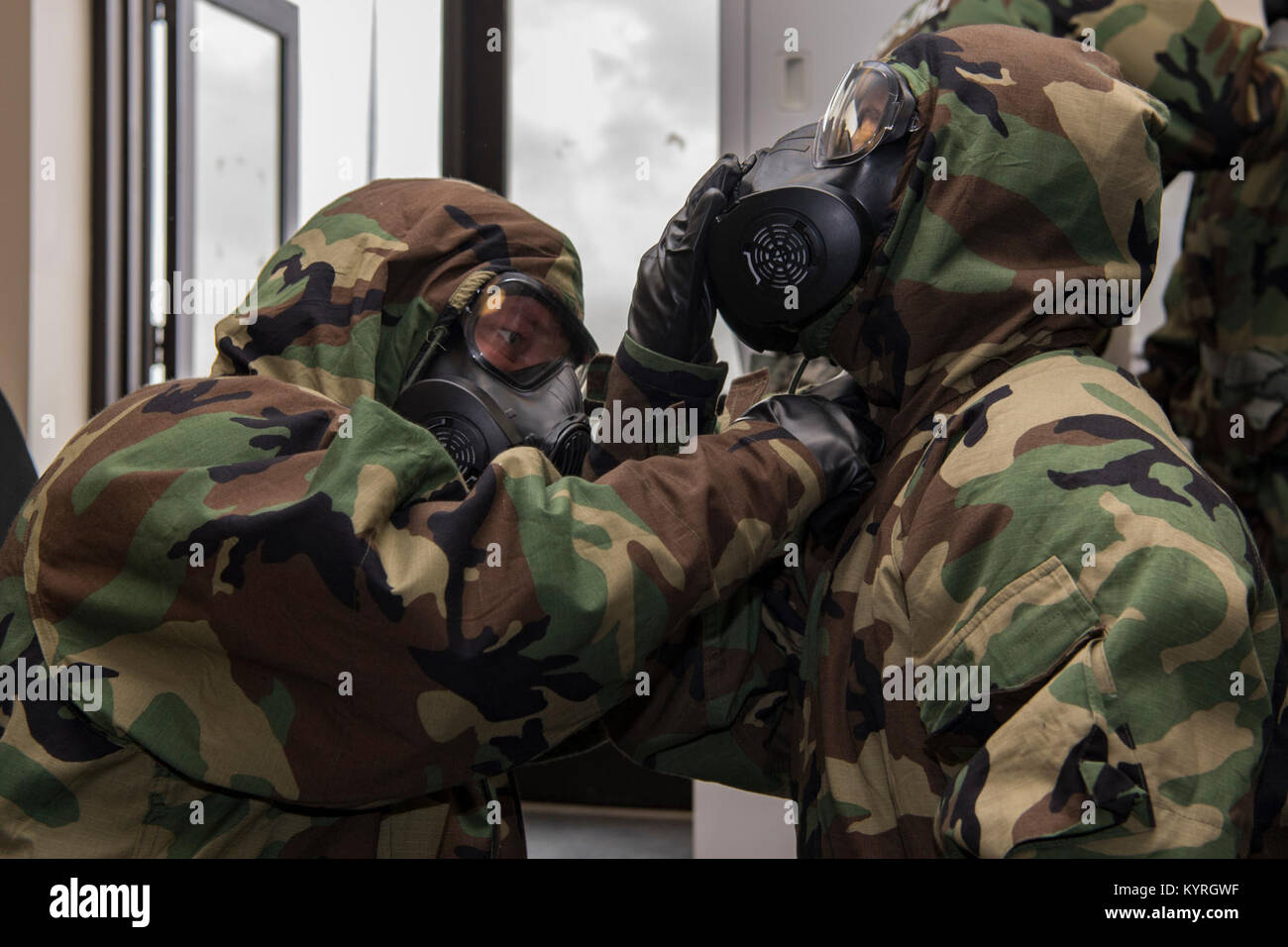 Airmen from the 130th Airlift Wing perform buddy checks on the Joint ...