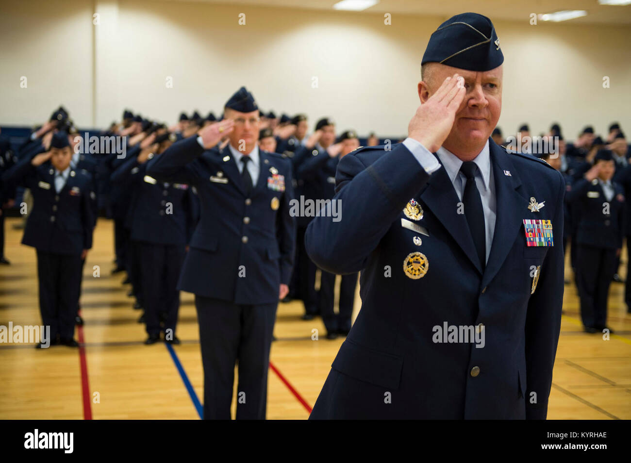 Members of Team Buckley present Col. David N. Miller, 460th Space Wing ...