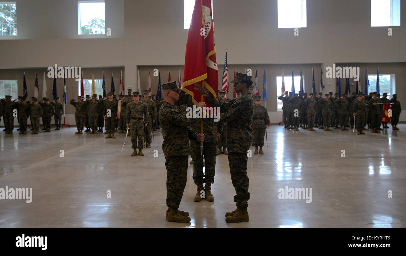 U.S. Marine Corps Sgt. Maj. Robin C. Fortner, right, out-going director ...