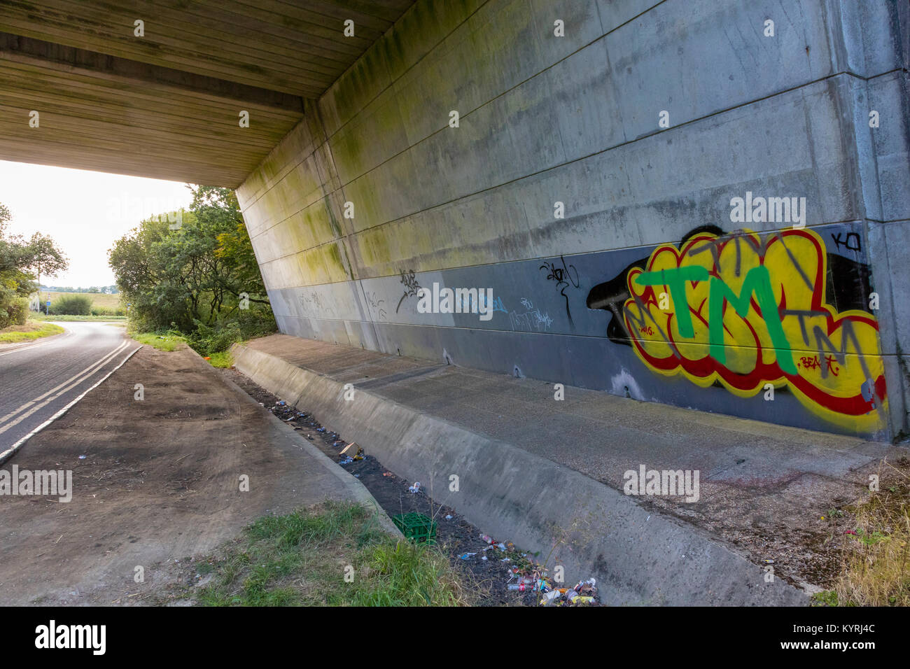 Brightly coloured graffiti on a road fly over on the A21 near Tonbridge ...