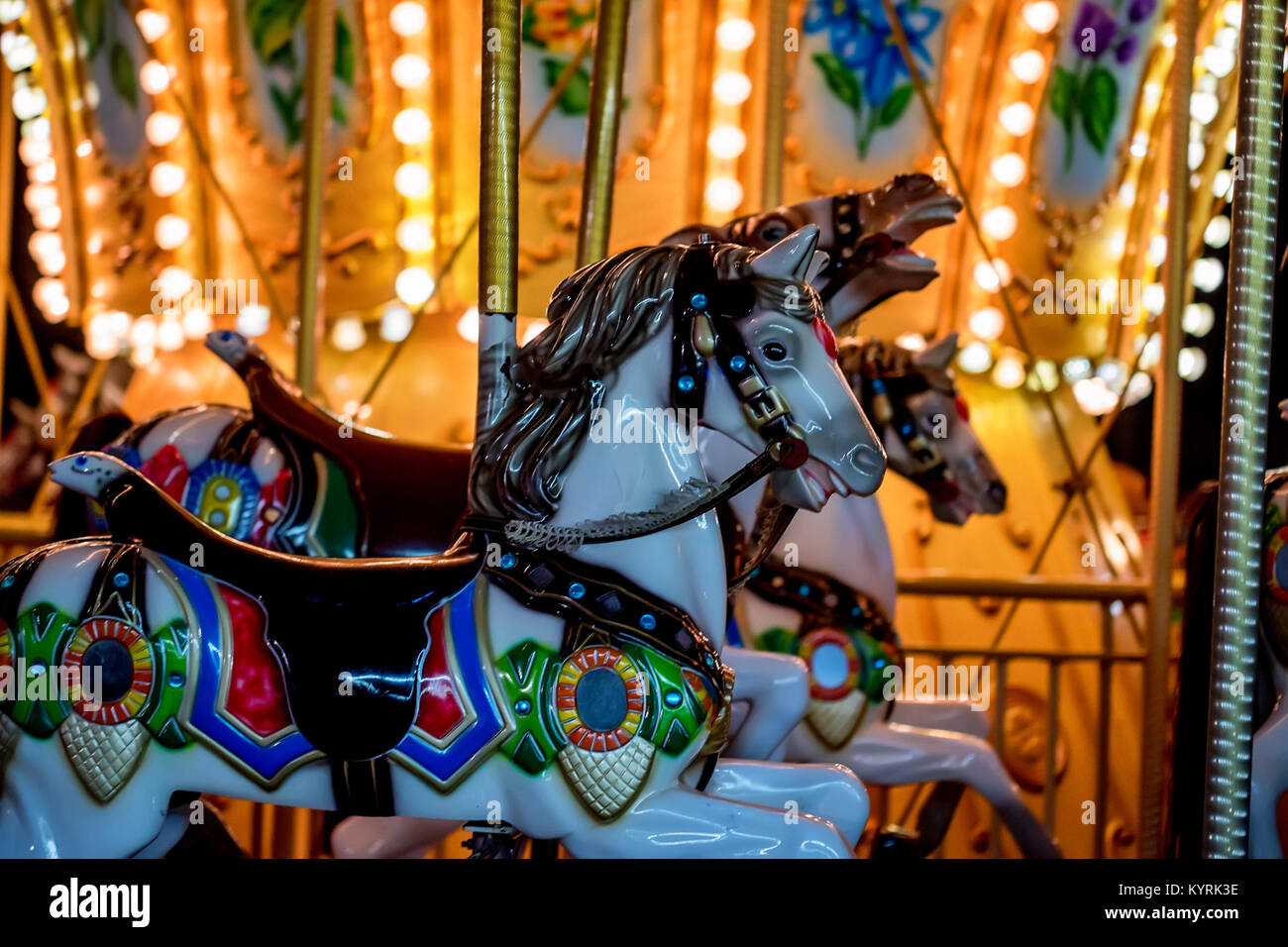 Carousel at fun fair Stock Photo - Alamy