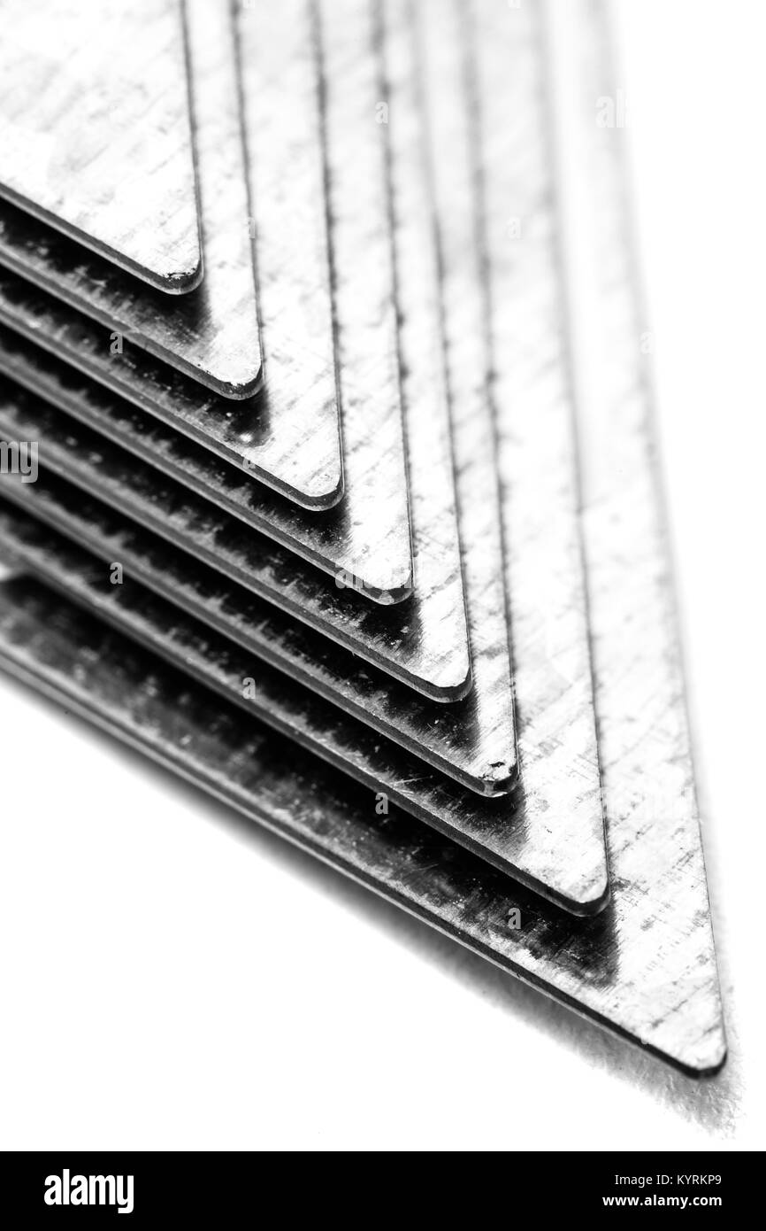 group of triangular metal fixators isolated on white background Stock ...