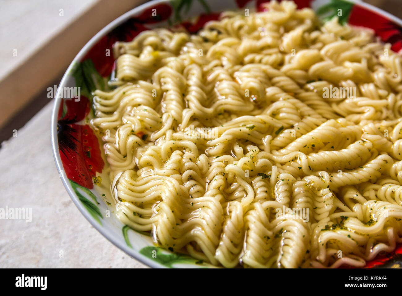 Plate full with spaghetti. Food background Stock Photo - Alamy