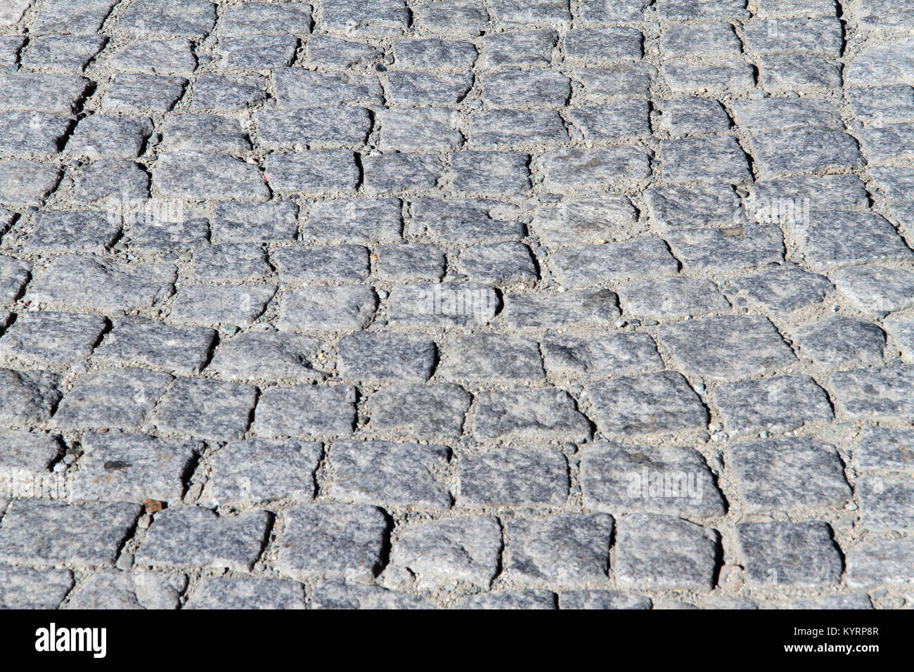 Cobblestones on the road in european city Stock Photo - Alamy