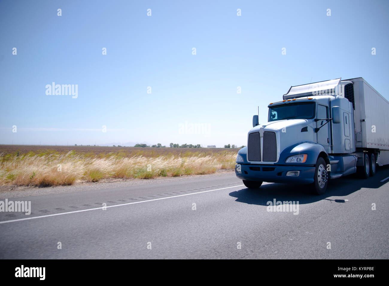 Big powerful custom built big rig semi truck with refrigerated trailer ...