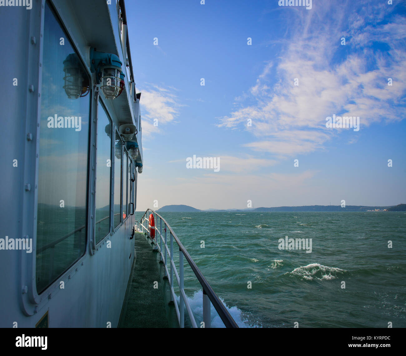 A ferry running on blue sea in summer day Stock Photo - Alamy
