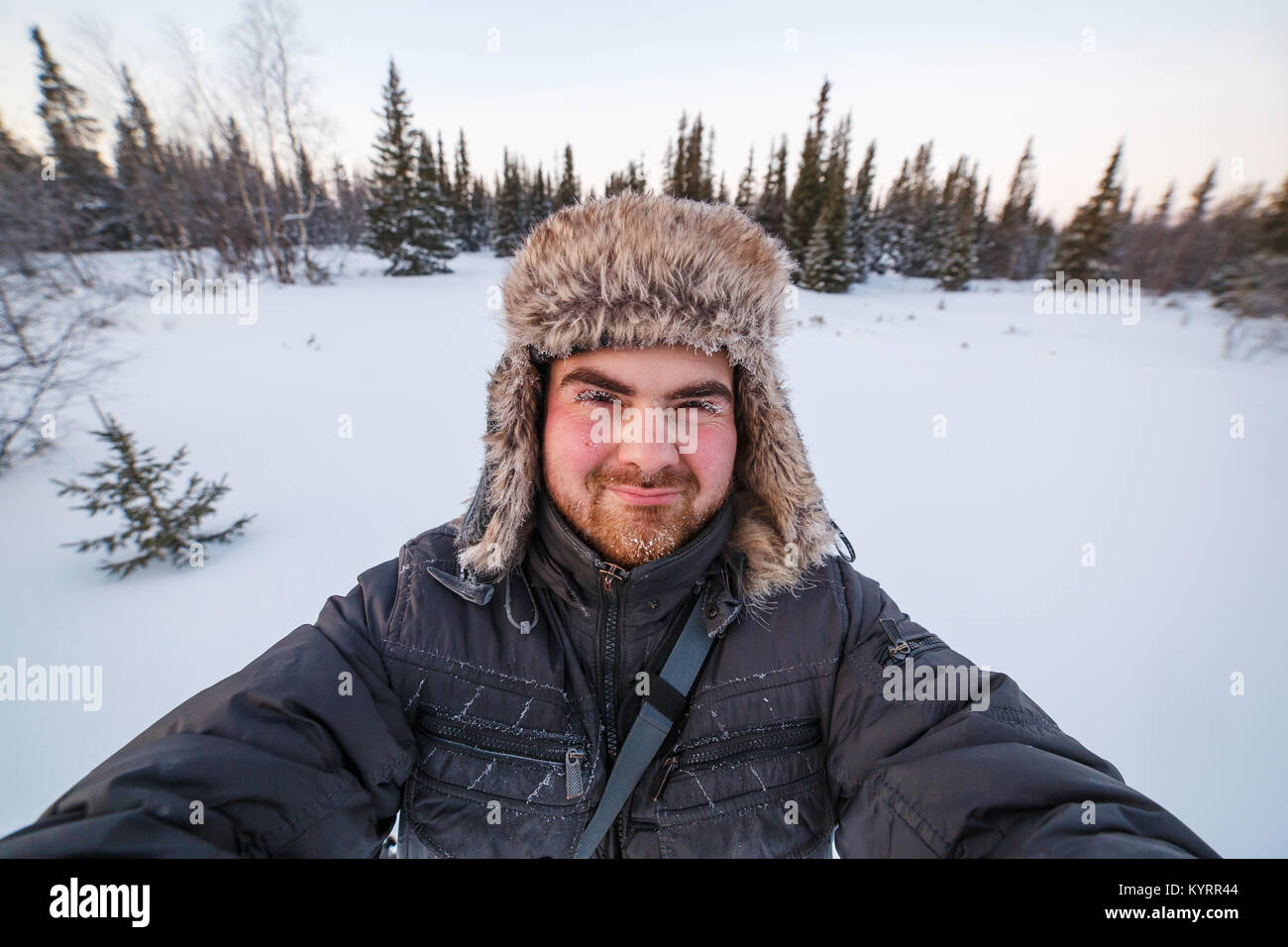 Close up portrait of middle aged man adventurer with frosted beard in ...
