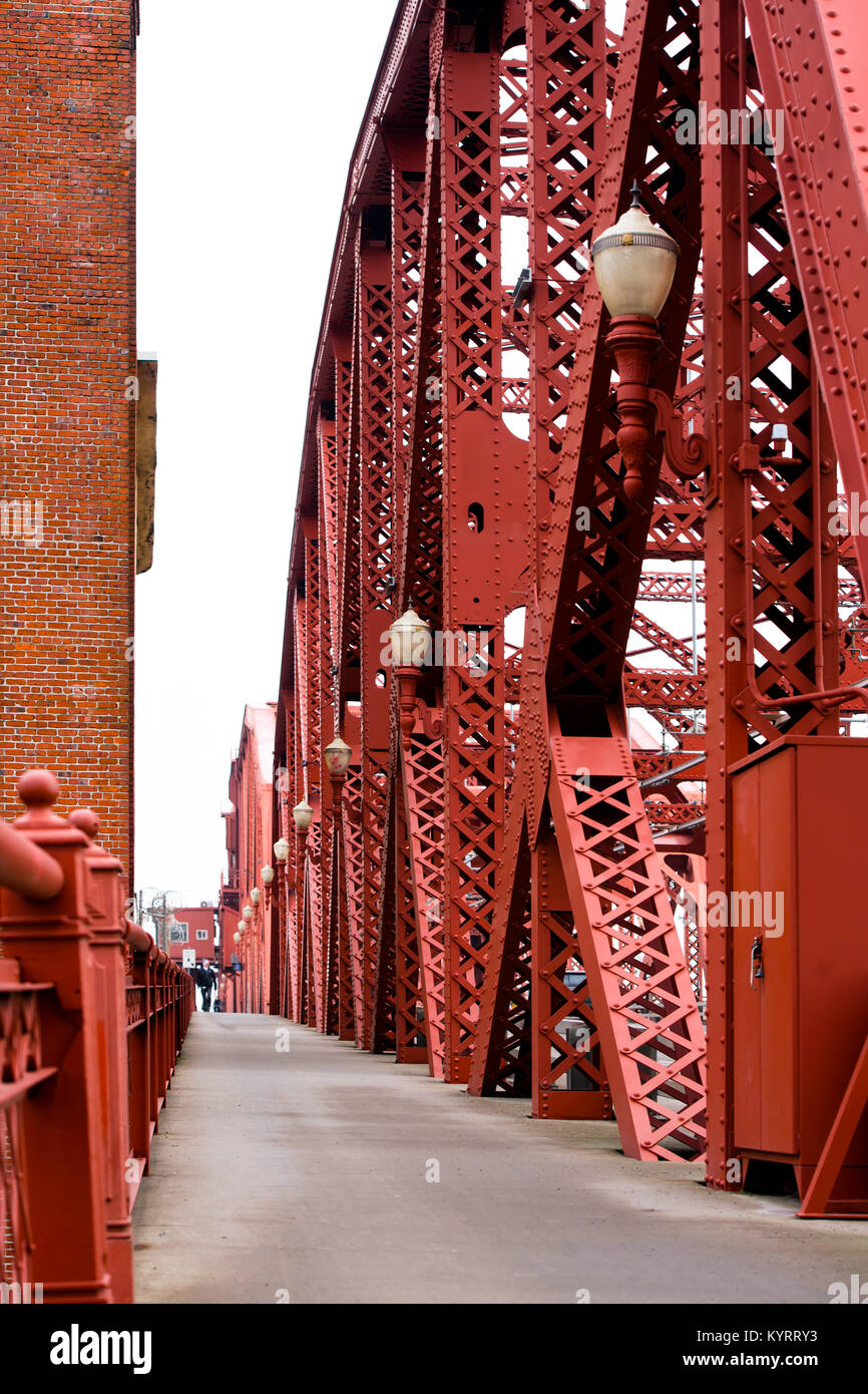 Spectacular red metal structures connected by rivets Broadway bridge ...