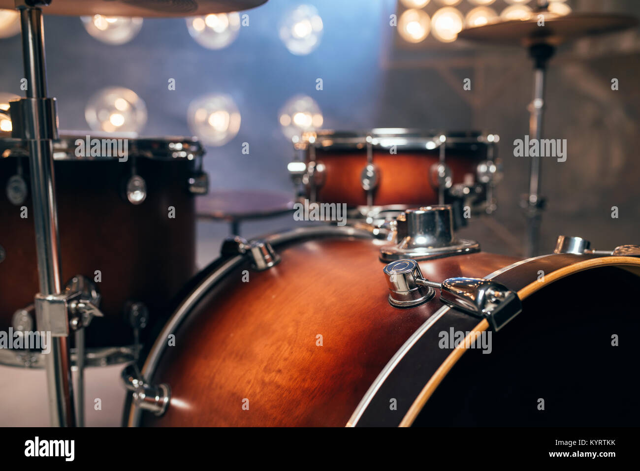 Drum-kit, drum-set, percussion instrument on the stage with lights ...