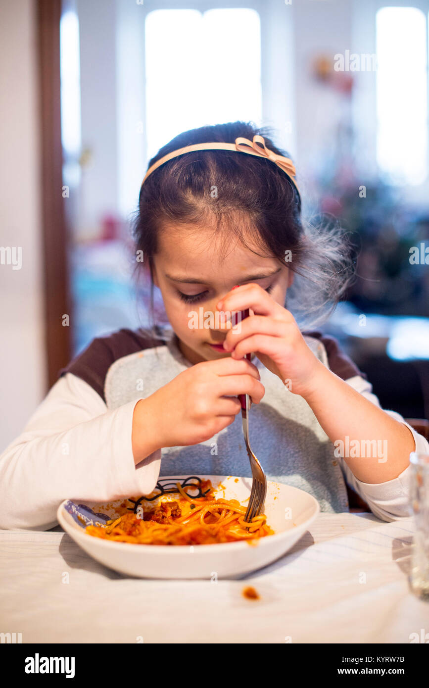 Child portrait eat spaghetti hungry hi-res stock photography and images ...
