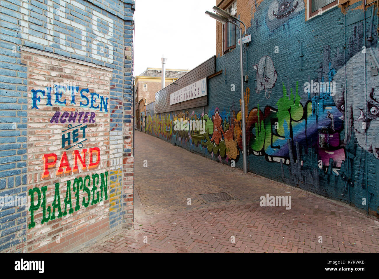 A hand-painted sign ona wall in Leeuwarden, the Netherlands. It asks ...
