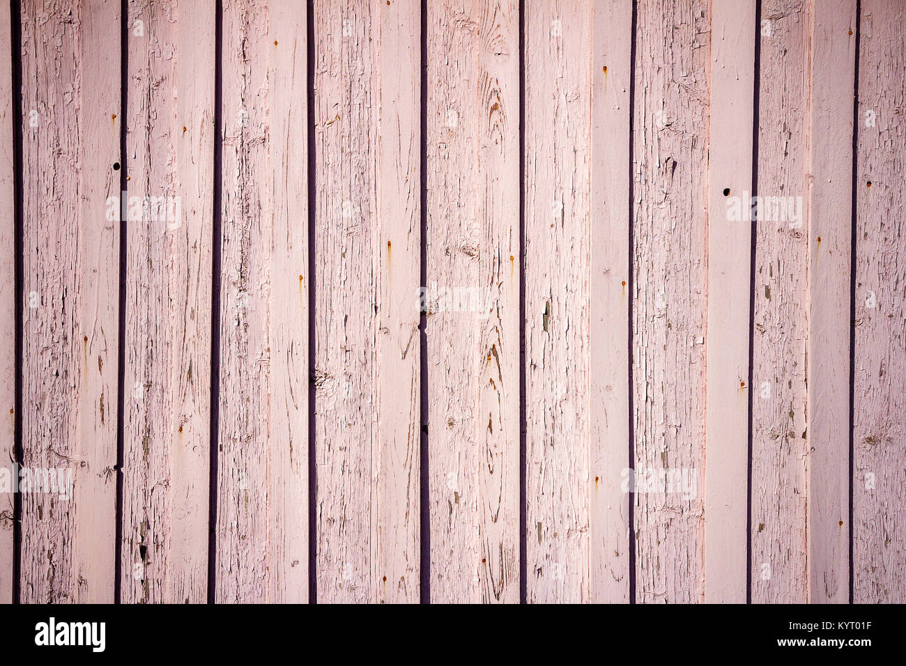 Peeling pink paint on weathered wood planks texture Stock Photo - Alamy
