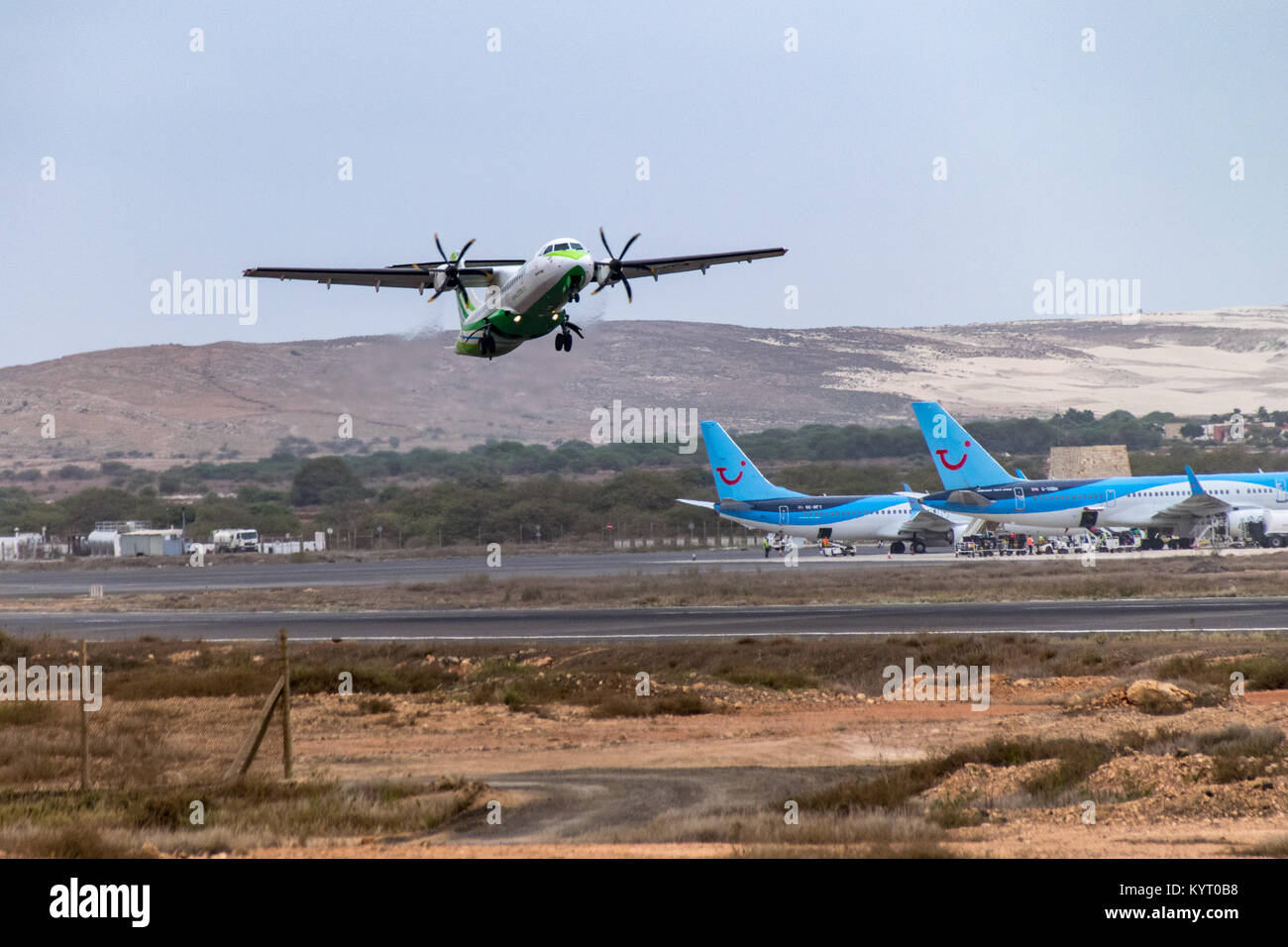 Propeller plane taking off from Aristides Pereira International Airport ...