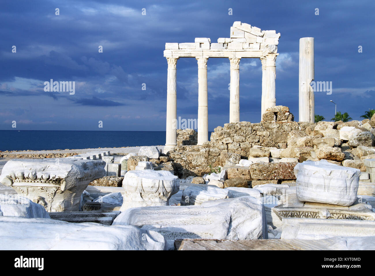 Dark blue sky and ruins of Apollo temple in Side, Turkey Stock Photo ...