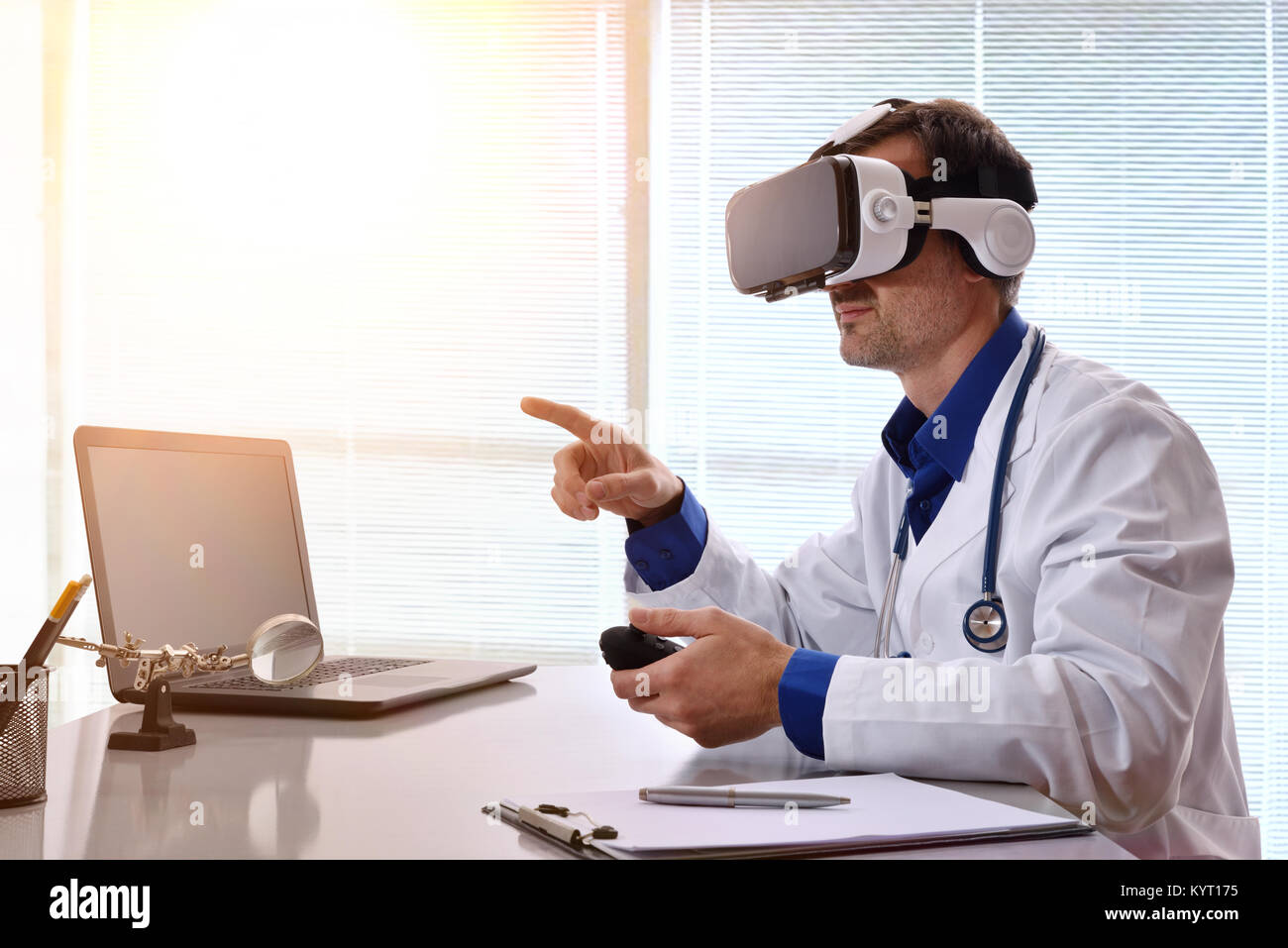 Doctor reviewing medical content 3d with virtual reality glasses in the ...