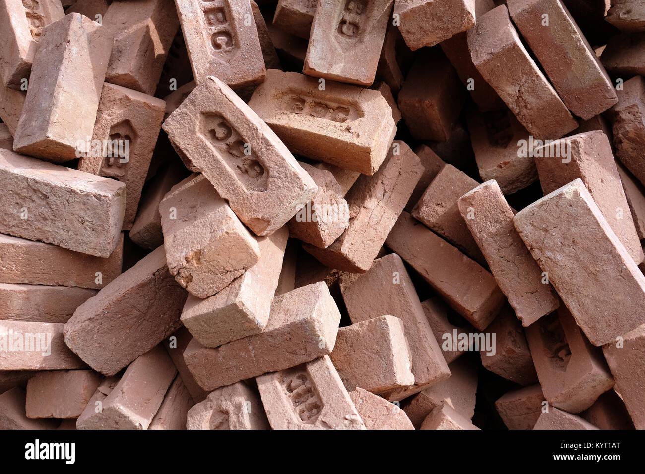 A pile of bricks at a construction site Stock Photo - Alamy