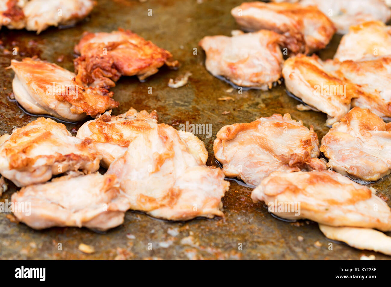 Grilled chicken steaks on metal pan Stock Photo - Alamy