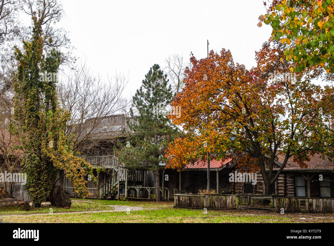 Abandonded old frontier city replica with log buildings in the autumn ...