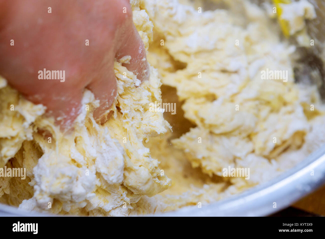 Preparing dough mixing ingredients hi-res stock photography and images ...