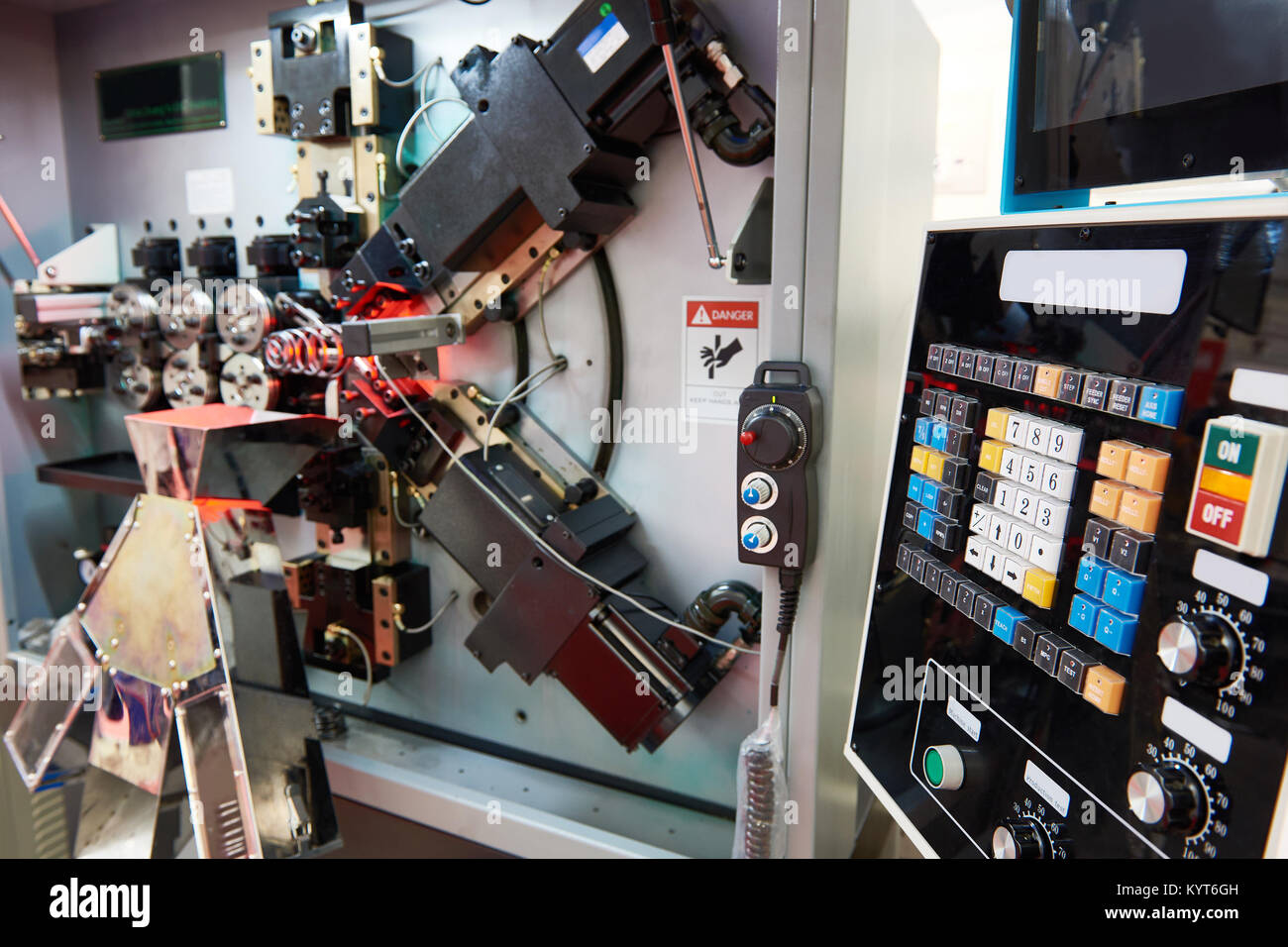 Industrial cnc spring making machine Stock Photo - Alamy